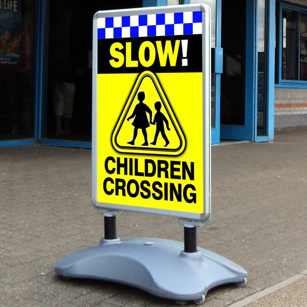 CHILDREN CROSSING SLOW Heavy Duty Pavement Safety Sign - Signs2Schools